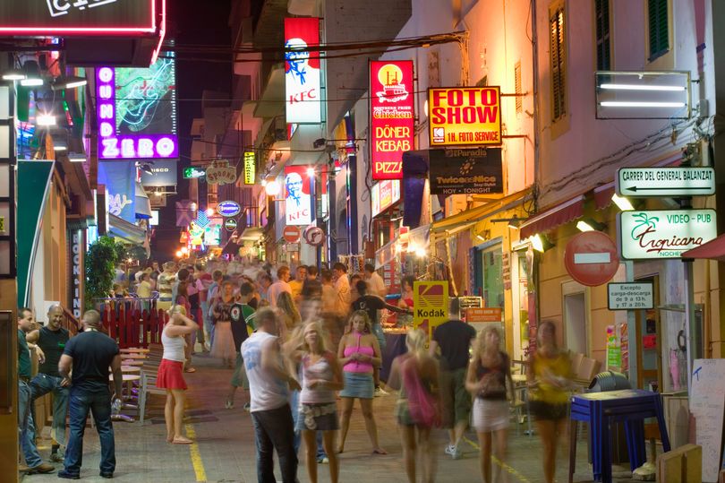 Ibiza chaos caught on camera as woman is hit with chair in pool party brawl