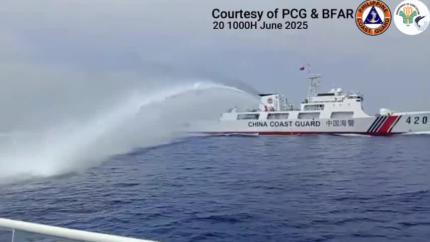 China Coast Guard Fires Water Cannon In South China Sea