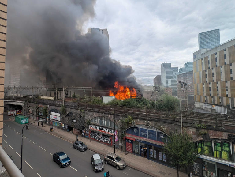 Huge fire in Manchester forces evacuations and delays