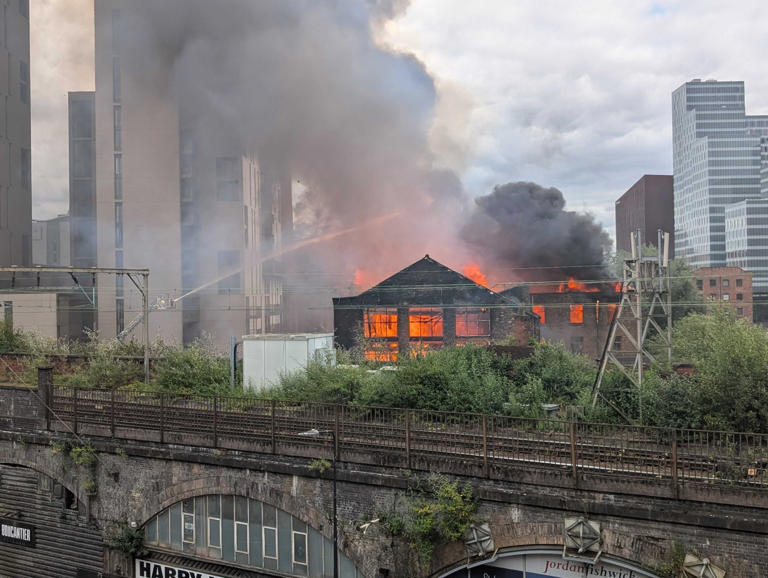 Huge fire in Manchester forces evacuations and delays