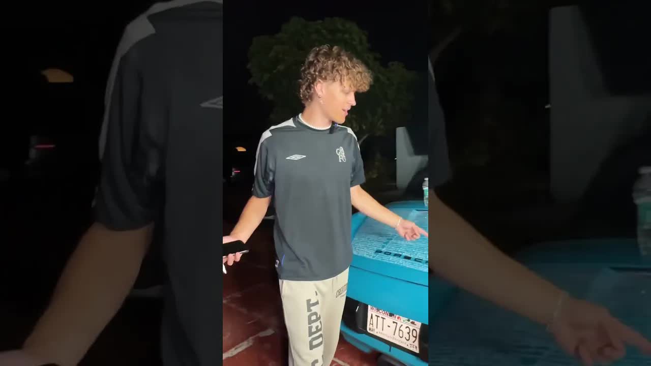 logan micke: writing fan names on porsche!