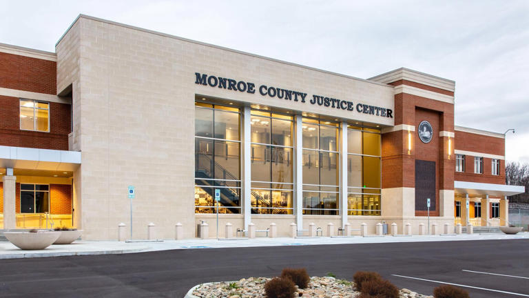 Monroe County officer fired, arrested after hiding contraband in Bible ...