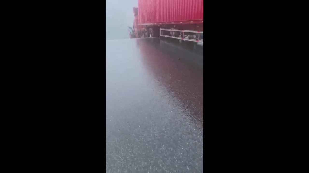 Truck left hanging over abyss when bridge collapses in China