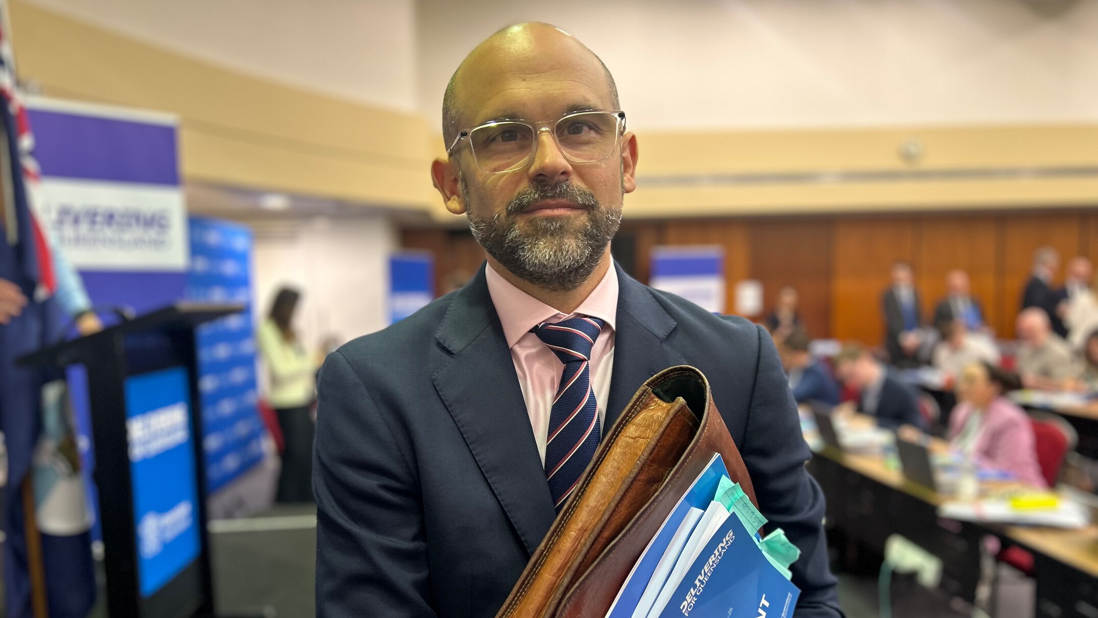 Queensland Treasurer David Janetzki hands down budget, targets cost-of ...