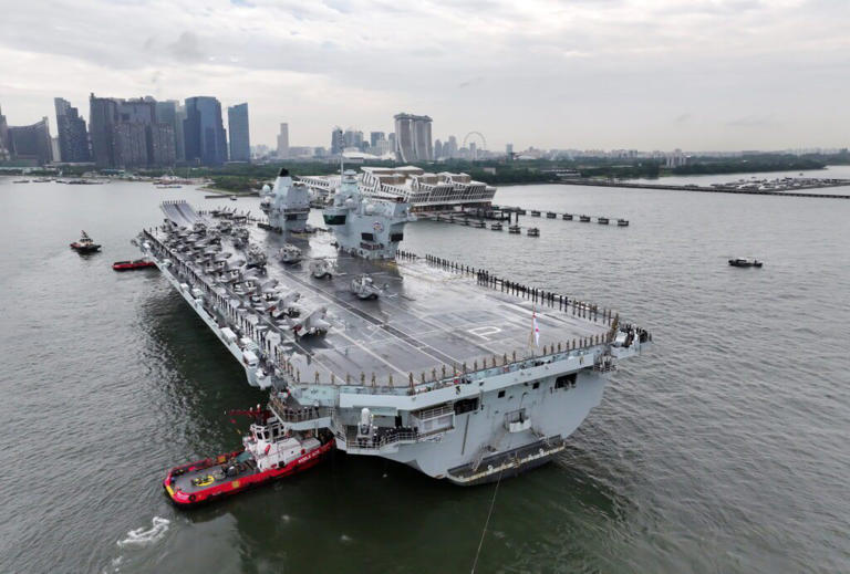 HMS Prince of Wales arrives in Singapore ahead of major international ...