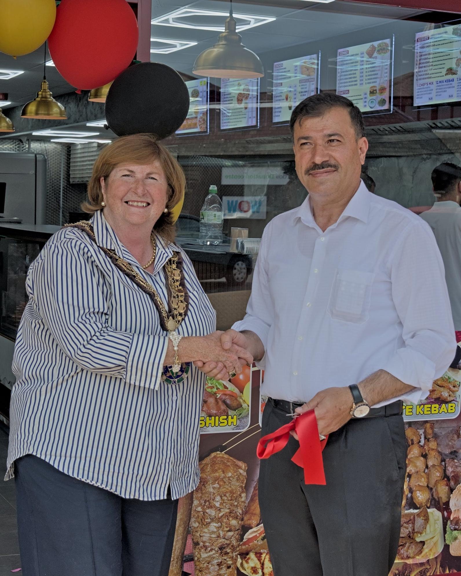 Grand opening of Sandy Grill and Pizza