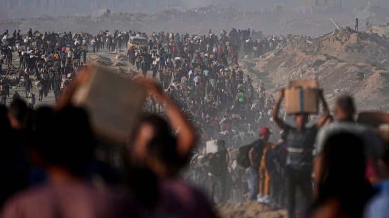 At least 25 killed after Israeli army opens fire near aid trucks in ...