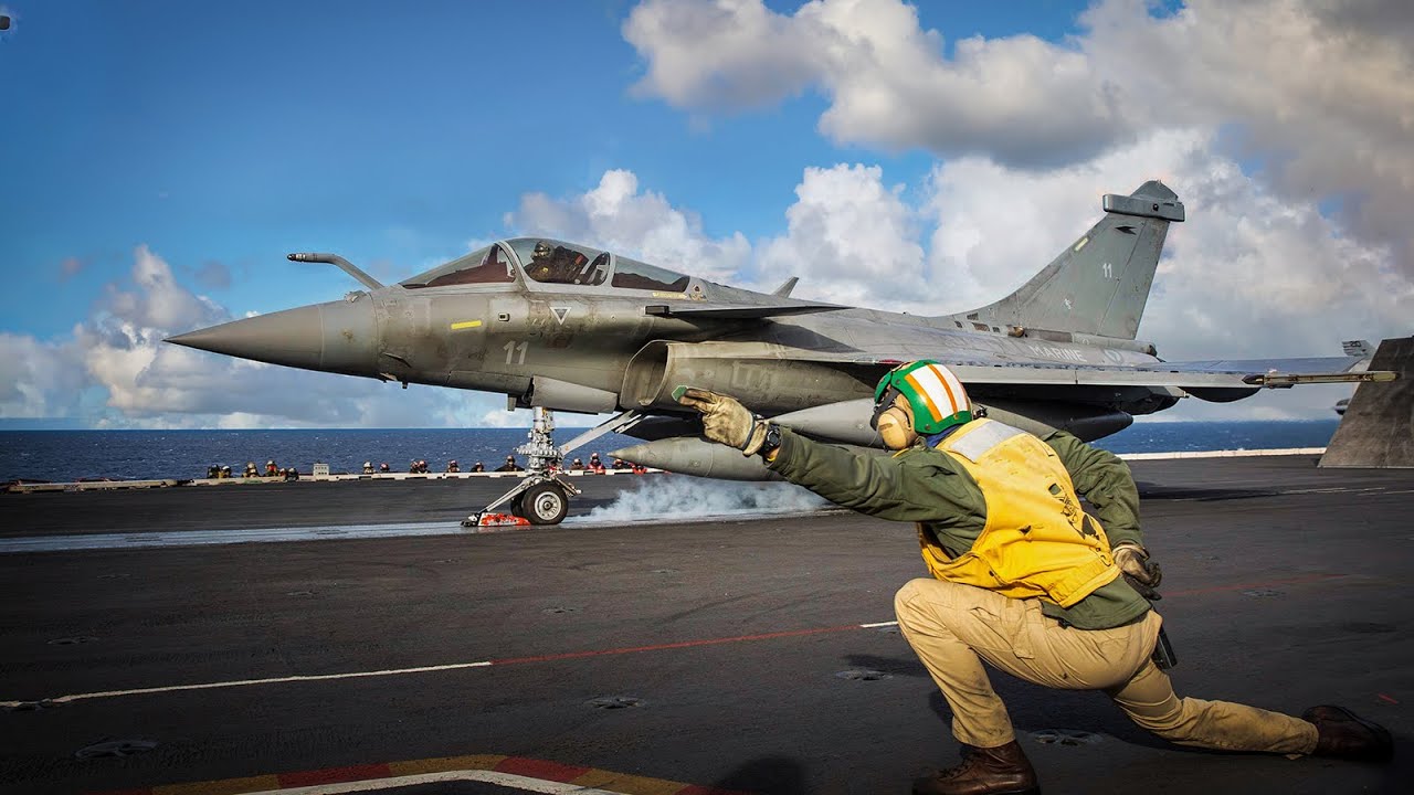 The Explosive Power of Rafale Jets Taking Flight at Sea