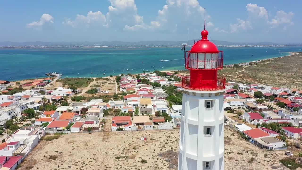 Drone's Eye View: Serene Ilha do Farol's Lighthouse & Shores