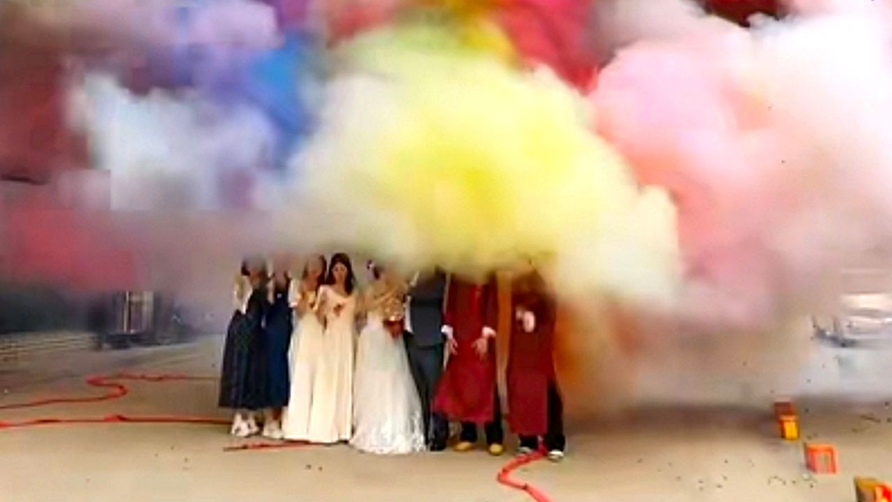 Up in smoke! Wedding photo turns chaotic as fireworks engulf bride and ...