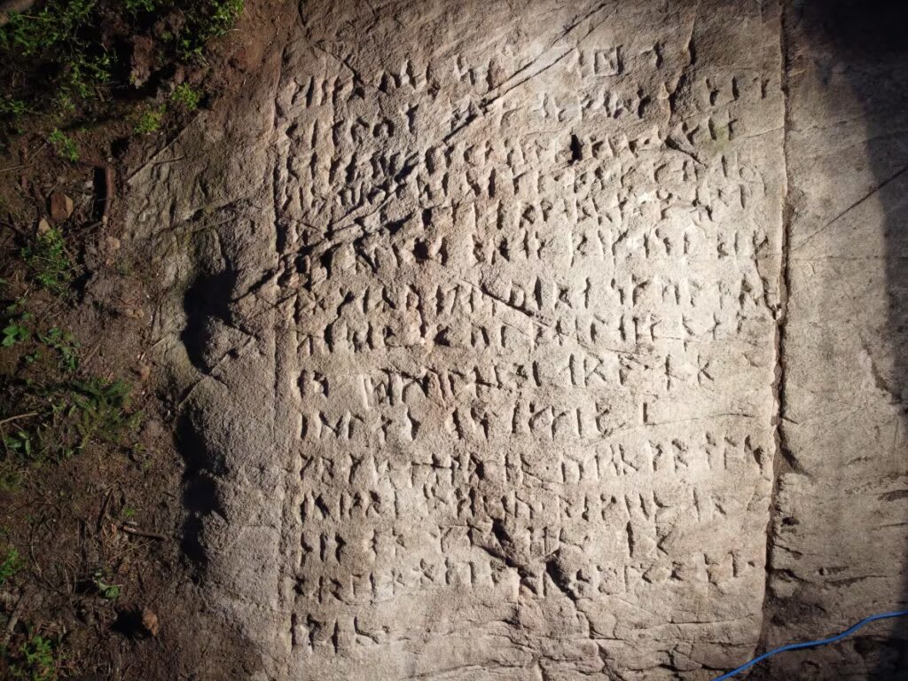 Archaeologists Find Mysterious Stone Slab With 255 Runes in Canada