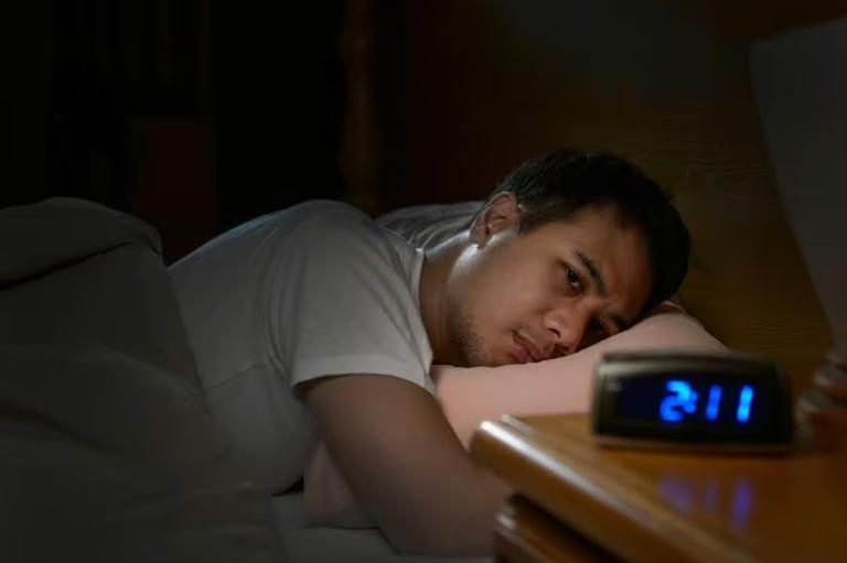 People who regularly wake up around 2am 'need to see a GP'