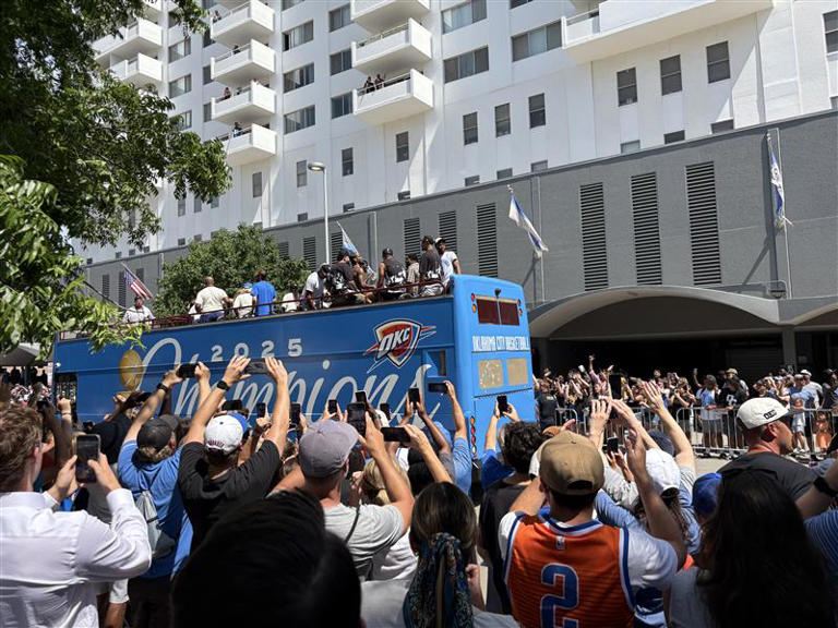 OKC Thunder players leave parade bus to greet fans, bring trophy to the ...