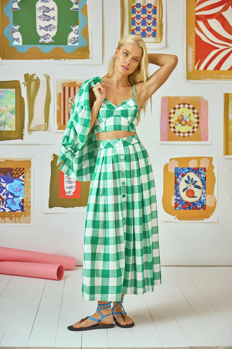 Taylor Swift wore a crop top and skirt by Houston fashion designer ...