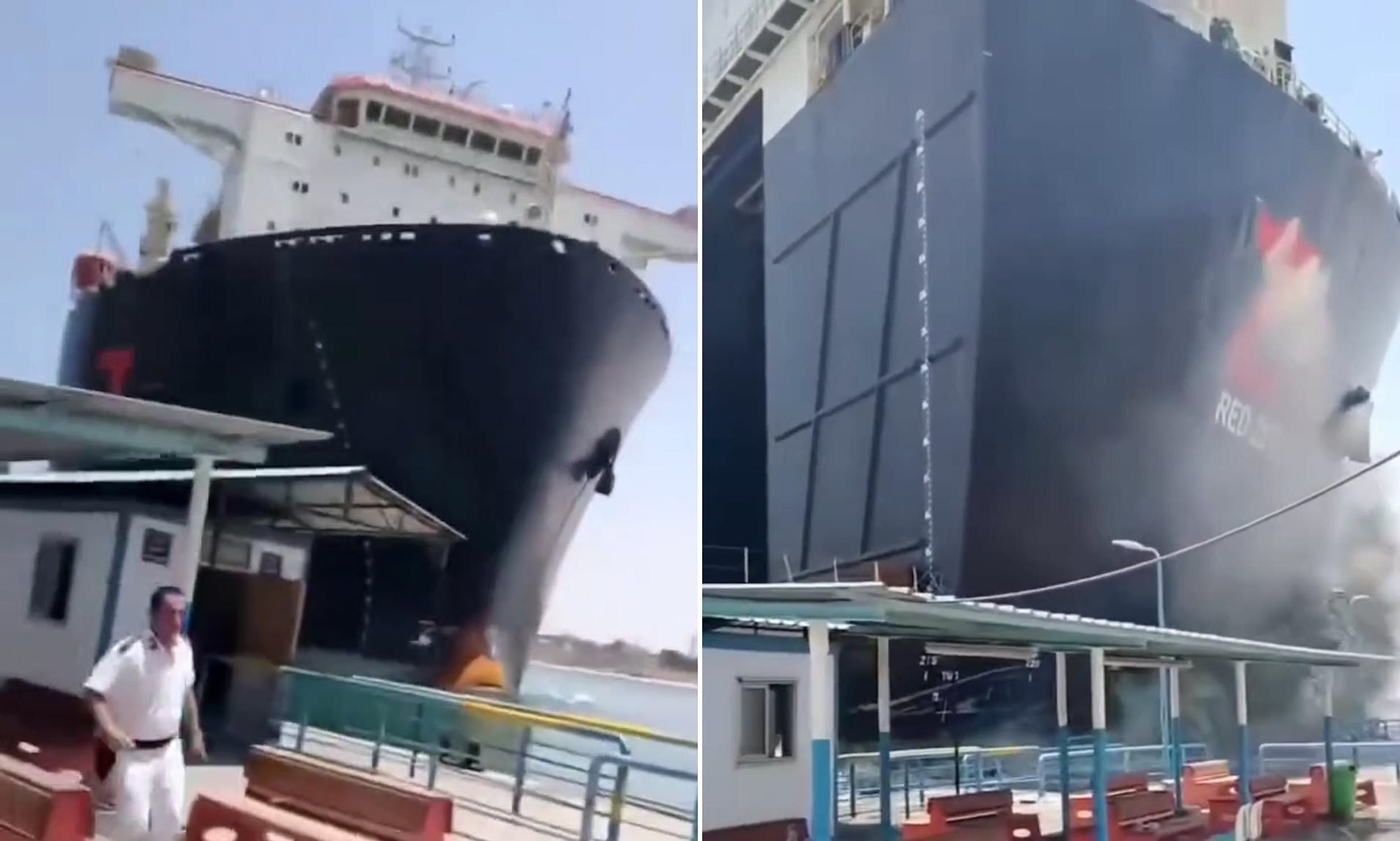 Moment out-of-control 700ft cargo ship crunches into Suez Canal port as ...