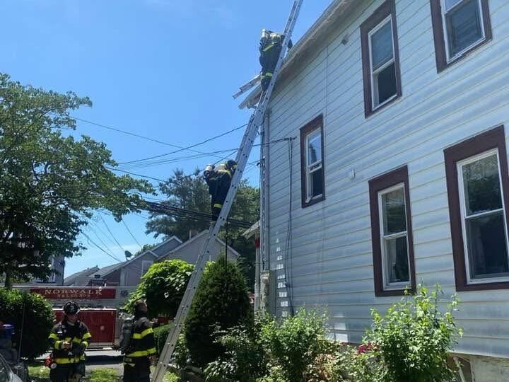1 firefighter hospitalized, 4 families displaced in Norwalk house fire