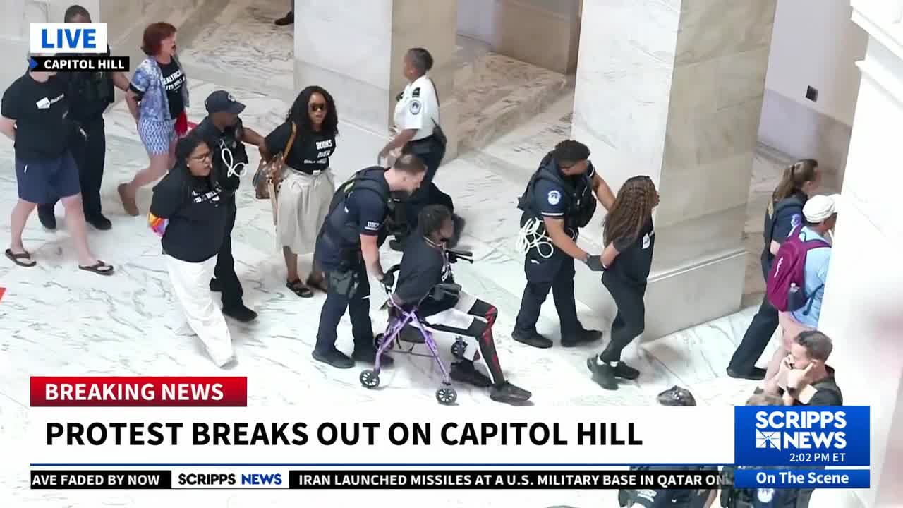 Protesters in wheelchairs zip-tied and escorted out of Capitol