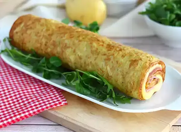 Potato roll with savoy raclette and ham