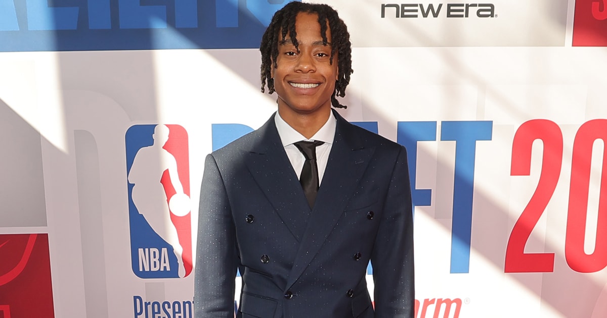 Tre Johnson dons green suit with knee-high shorts at 2025 NBA Draft
