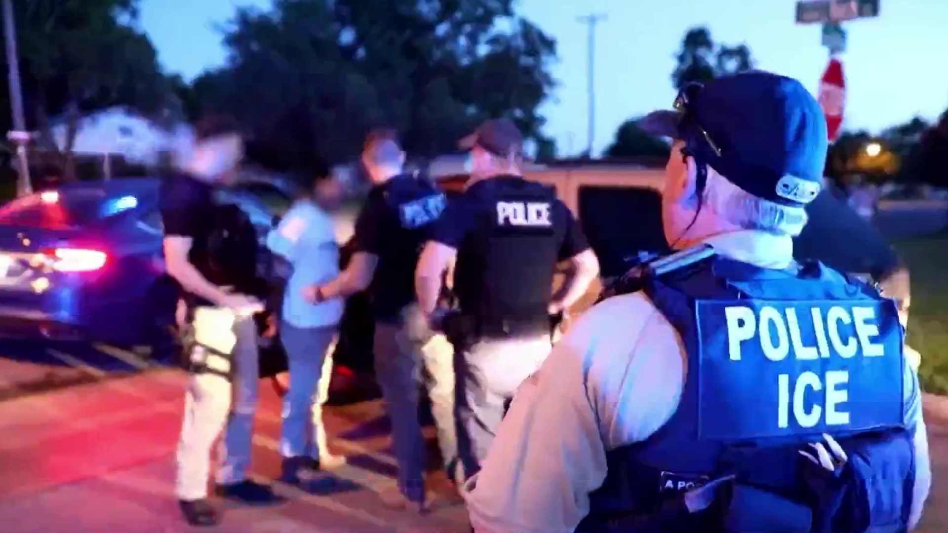 American teens were handcuffed after federal agents arrested their father