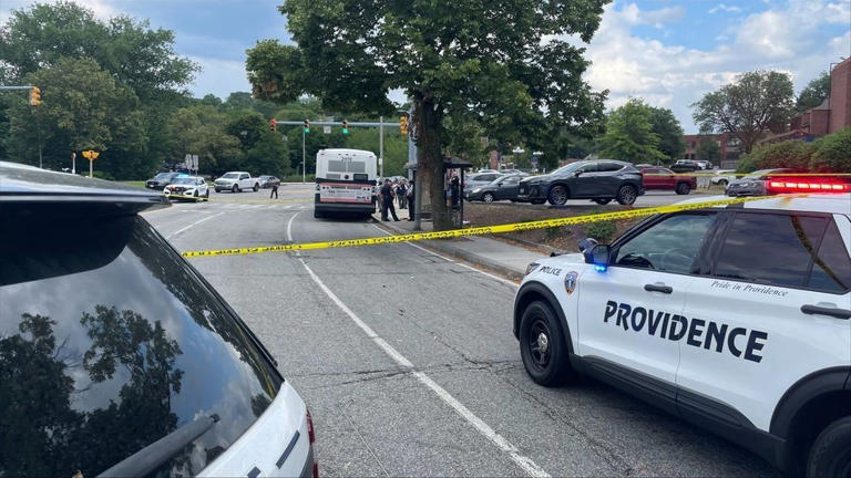 Man hospitalized after being trapped under RIPTA bus in Providence