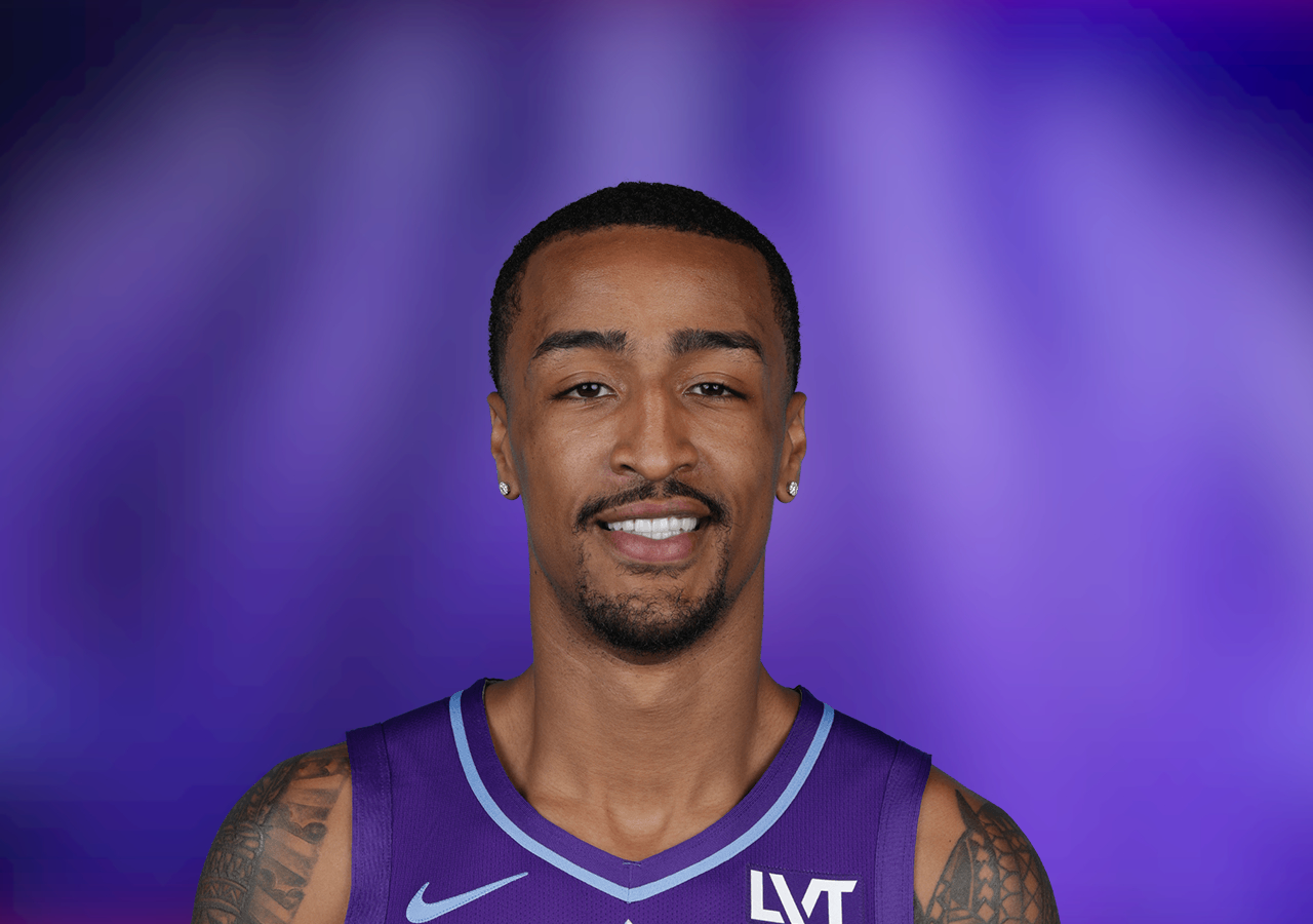 John Collins picks up option with Utah