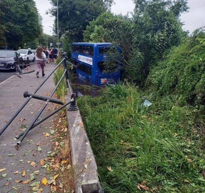 Several injured after double-decker college bus crashes into river in ...