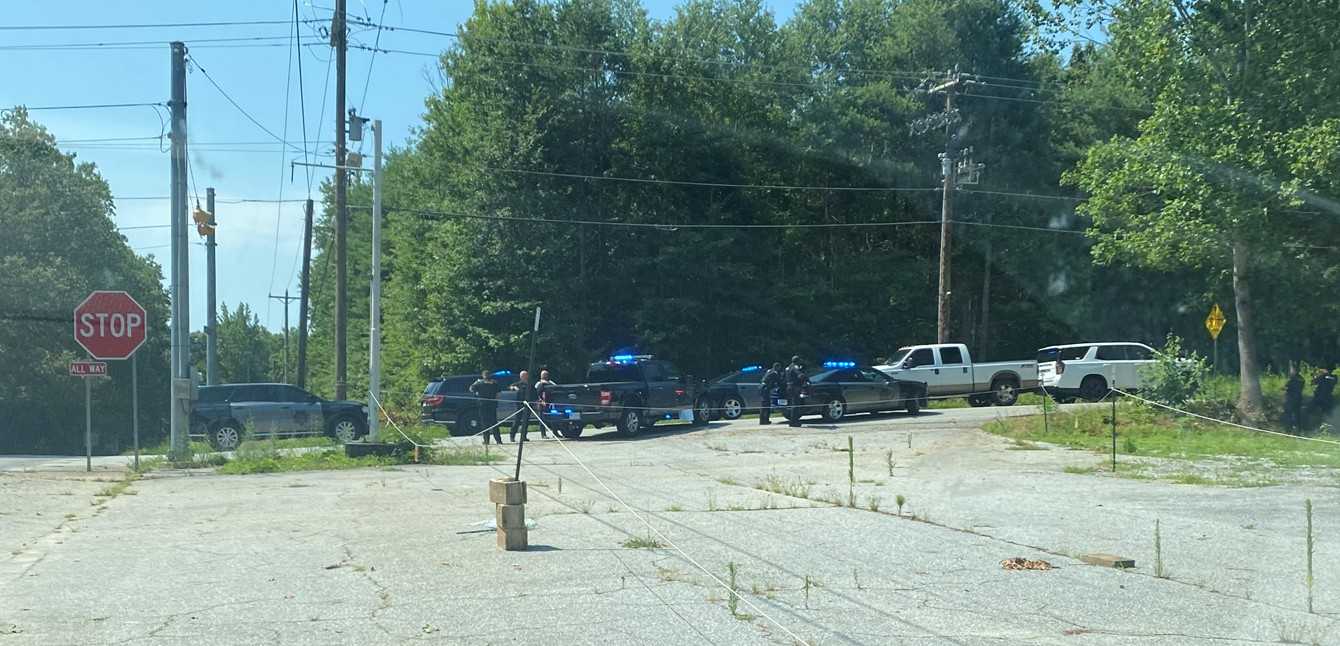 Standoff underway along Greenville County roadway; suspect barricaded in car, deputies say