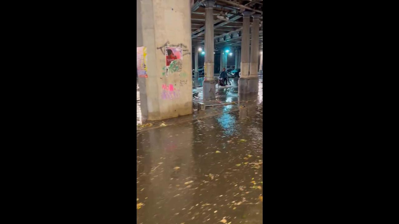 Floods swamp roads under SNCF bridge amid heavy rain in Paris