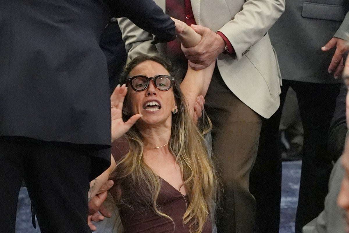 Shocking scenes as woman dragged out of meeting for trying to speak ...