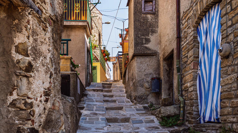 A Stone-Built Town Tucked In Italy's Southern Dolomites Offers ...