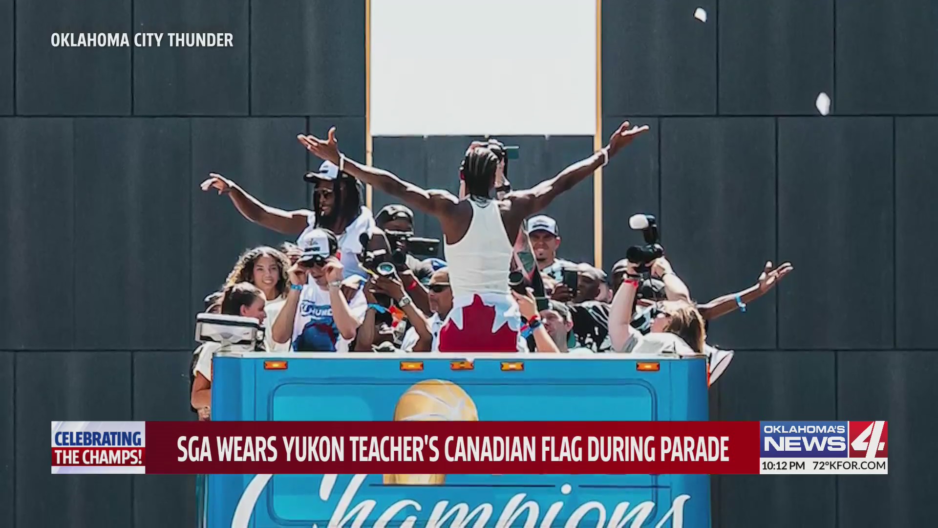 SGA wears Yukon teacher's Canadian flag during parade