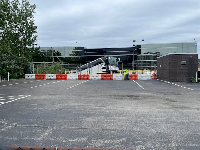Crews start work on removal of bus from partial garage collapse in ...
