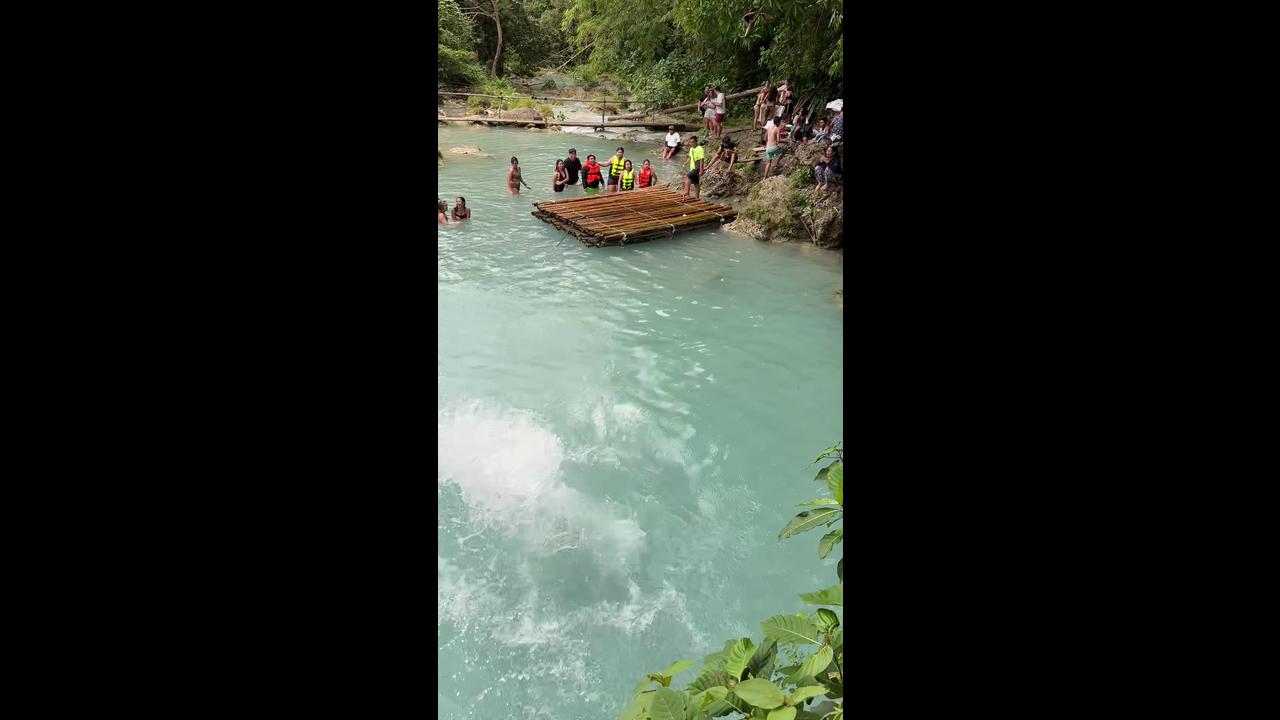 Rope swing into lagoon fails with a splash