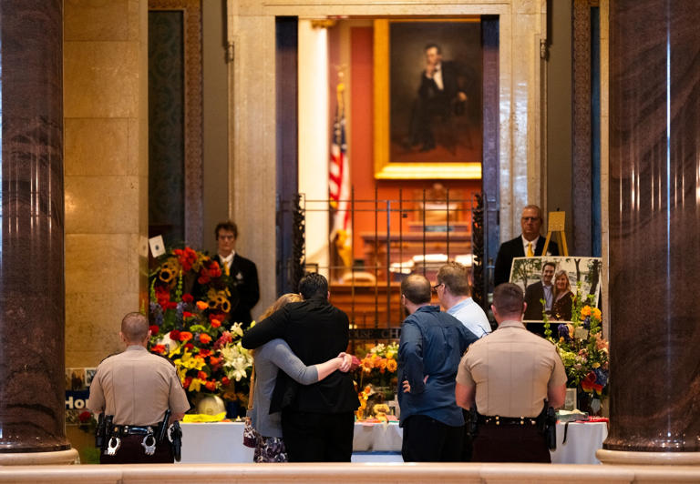 Slain lawmaker lies in state with her husband and dog at Minnesota capitol