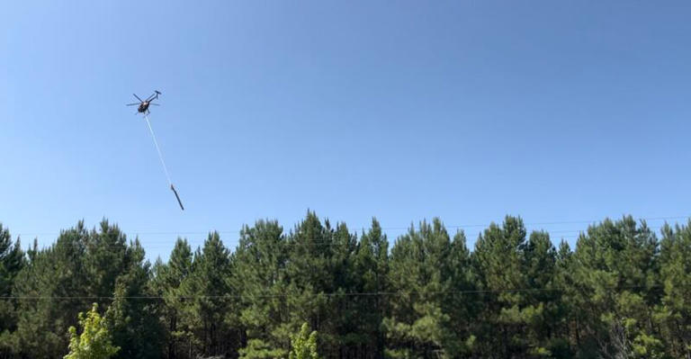 SWEPCO takes to the skies in helicopter to trim trees