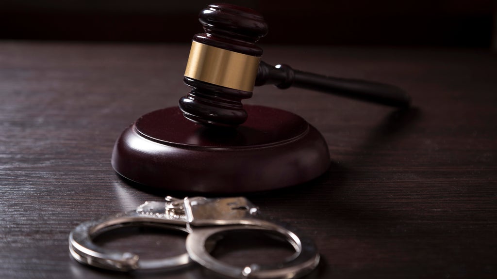 Convicted Detroit hitman under investigation over false testimony