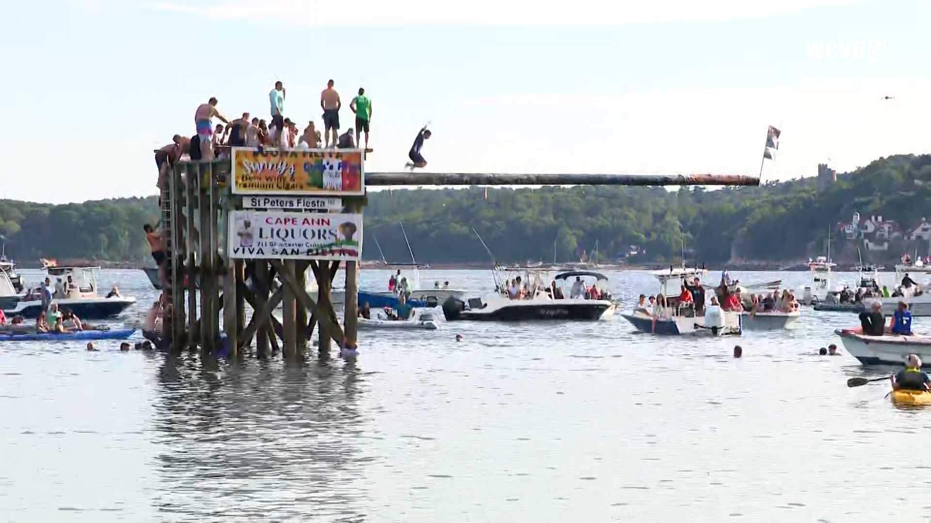 WATCH: Greasy pole returns to Gloucester waters for this unique Mass ...
