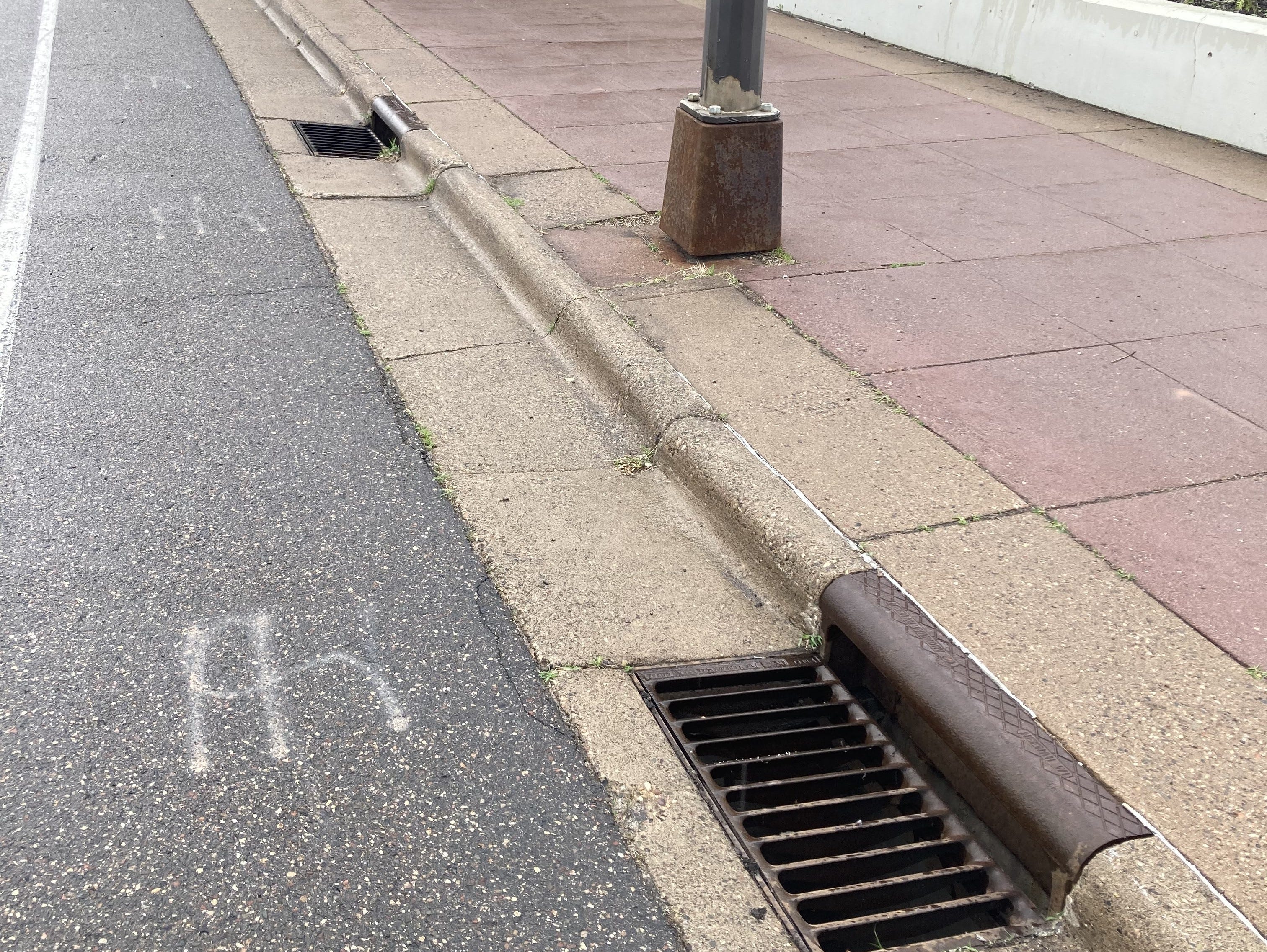 Why are storm drain grates disappearing in St. Paul?