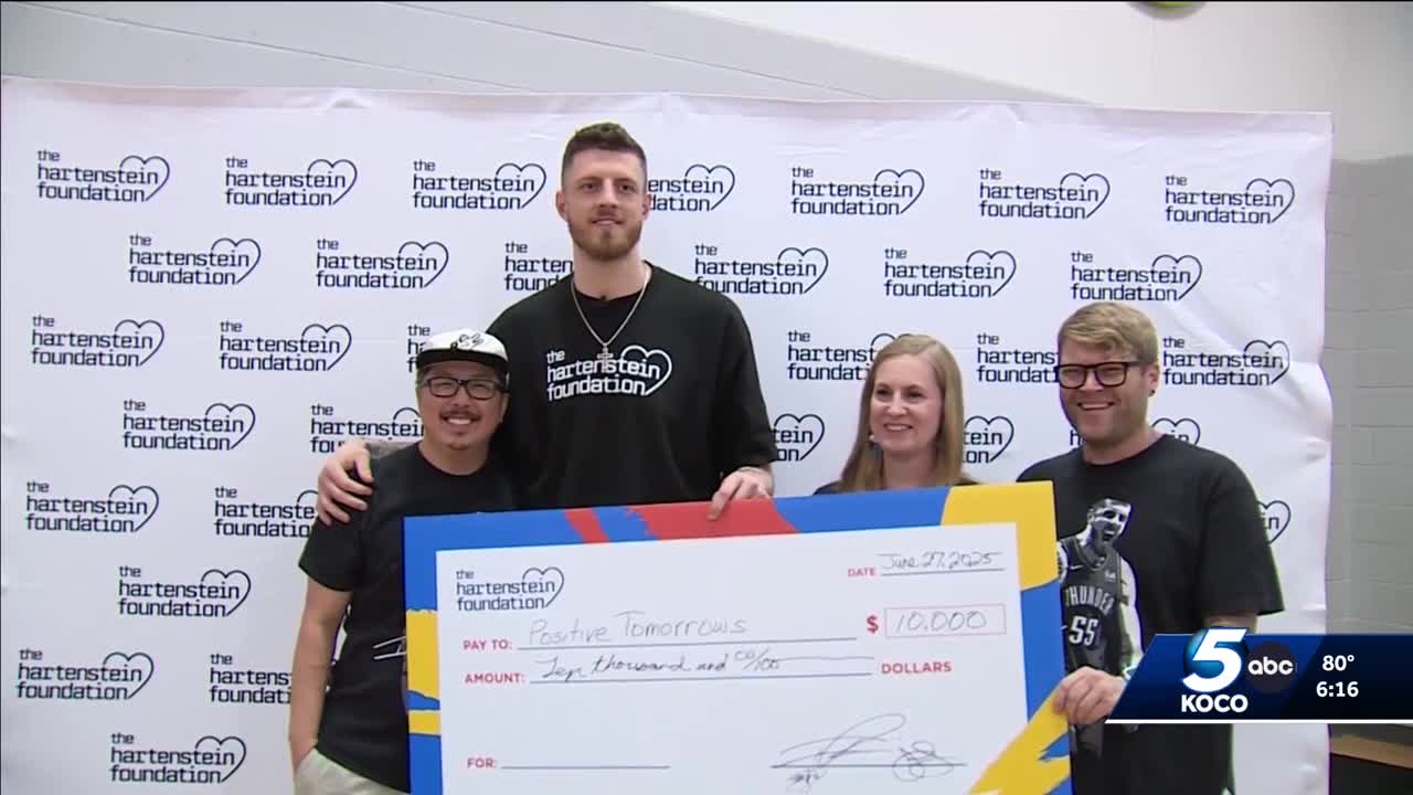 Isaiah Hartenstein delivers $10,000 raised from shirt sales to nonprofit for unhoused families