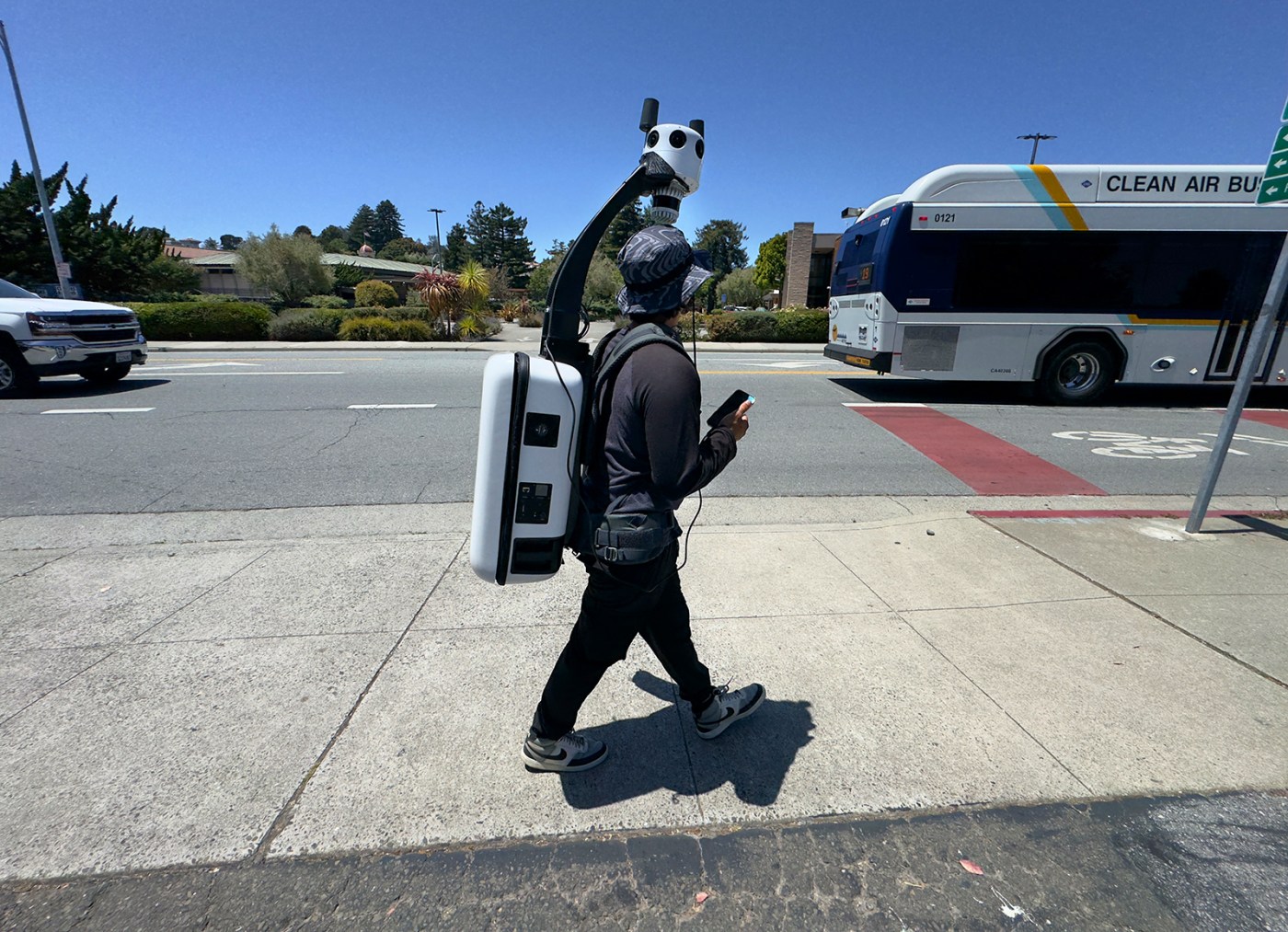 Photo | Man collects imagery for Apple Maps with camera backpack in Santa Cruz