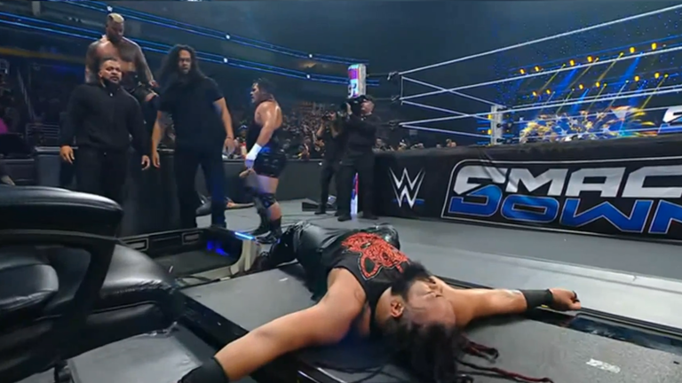 The Bloodline put Jacob Fatu through a table with a triple powerbomb on ...