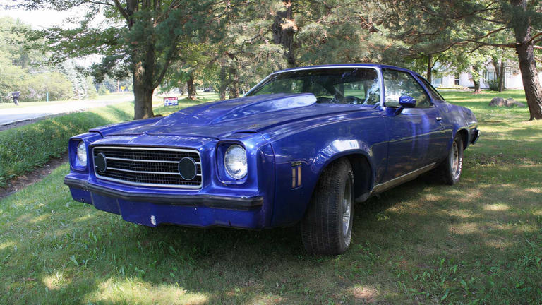 These 10 Classic Cars Had Wild Features Automakers Won’t Touch Again