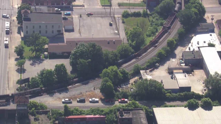 AERIALS: Train derails west of downtown Louisville in area of Broadway