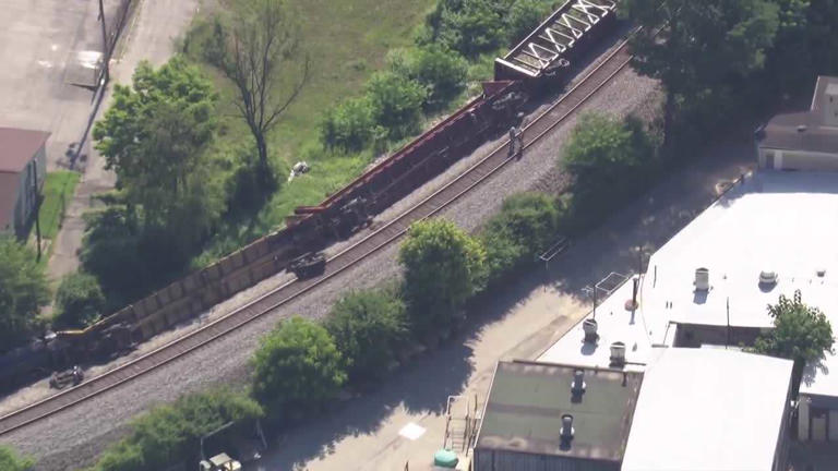 AERIALS: Train derails west of downtown Louisville in area of Broadway