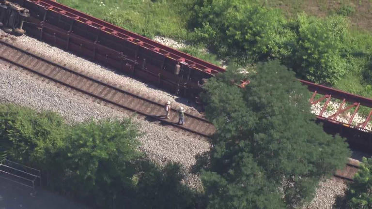AERIALS: Train derails west of downtown Louisville in area of Broadway