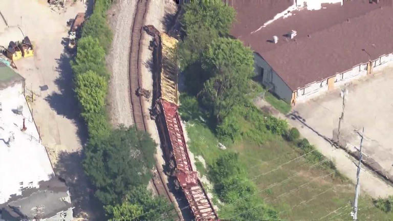 AERIALS: Train derails west of downtown Louisville in area of Broadway
