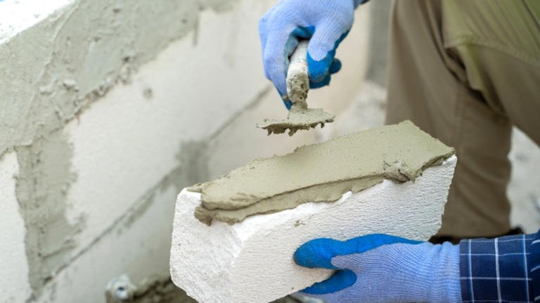 Give Your Fence An Upgrade With A Simple Cinderblock DIY That Looks ...