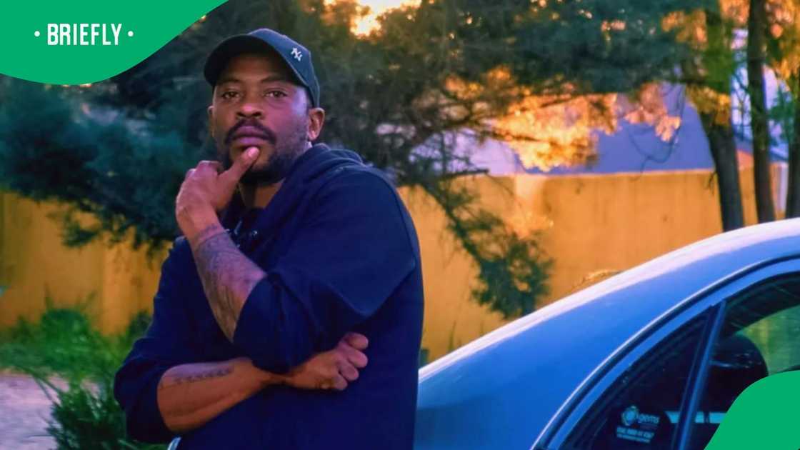 Graphic designer visits graveyard to show off celebrity tombstones he designed, including ...