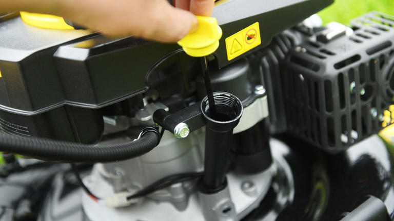 Overfilled Your Mower? An Empty Soap Bottle Might Be The Easiest Fix